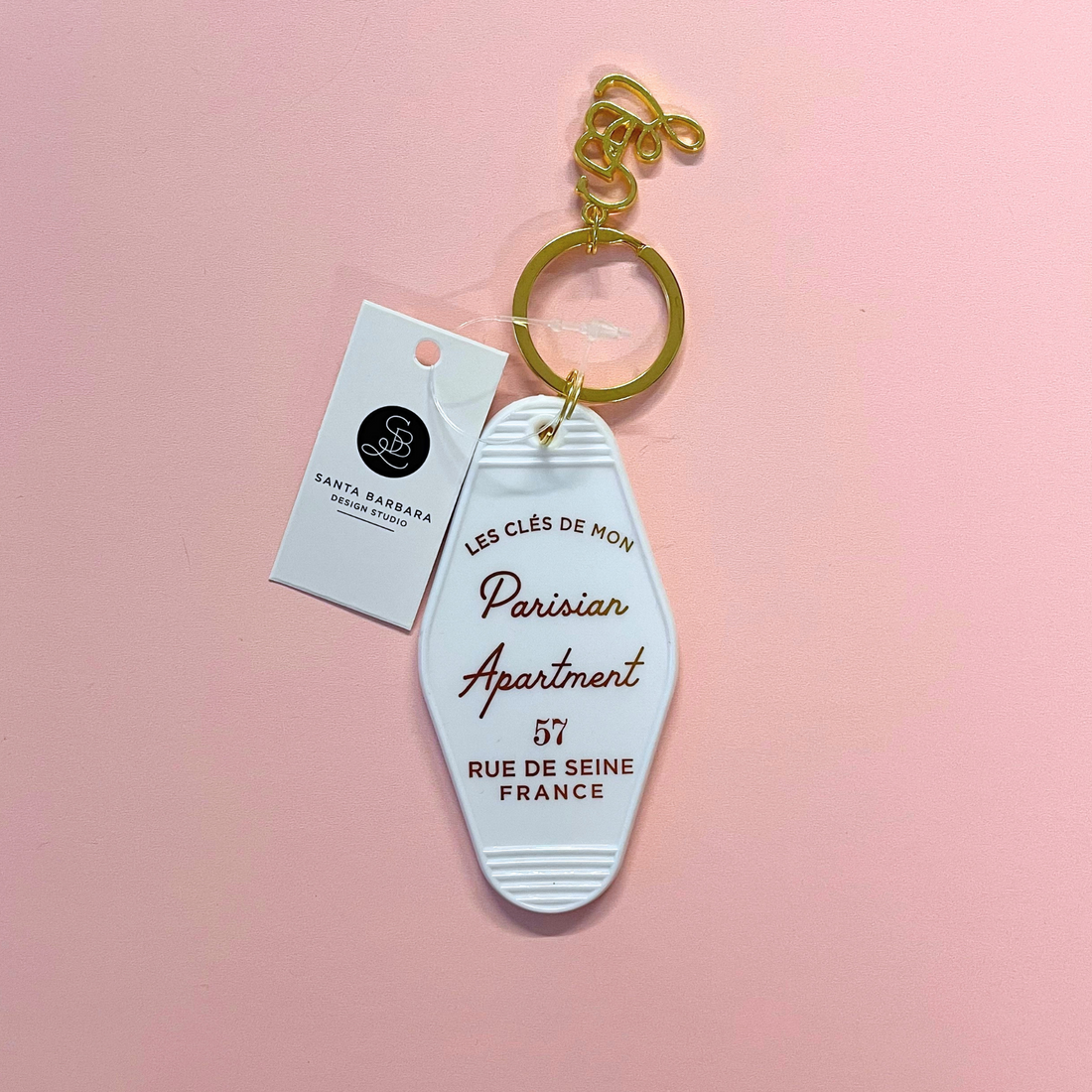 Parisian Apartment Motel Keychain in White – The Bullish Store